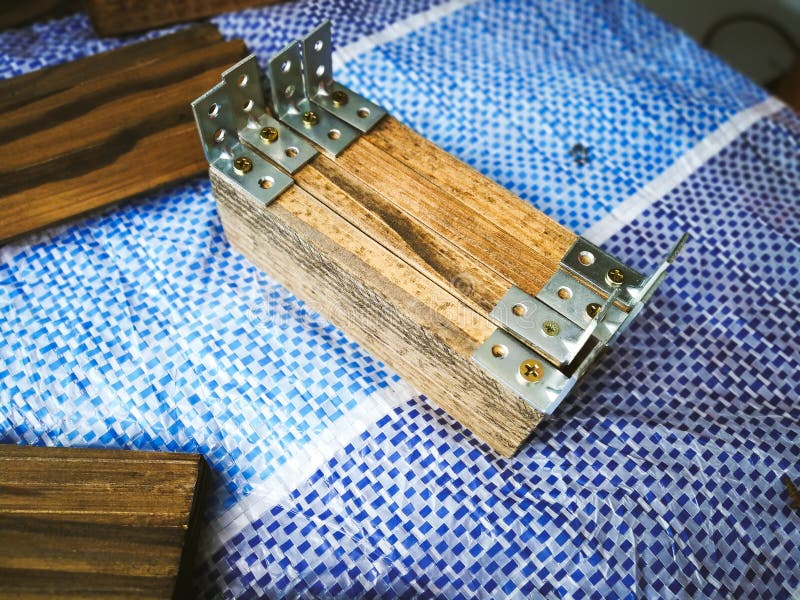 Iron Angle Brackets Attached on the Wooden Planks. Stock Image - Image ...