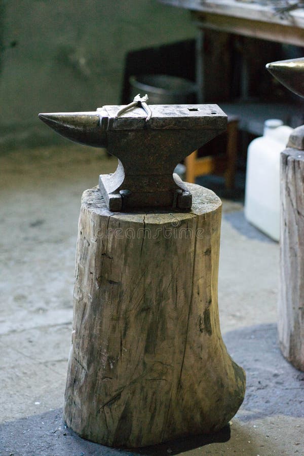 Iron Anvil Stands on a Wooden Stump Stock Image - Image of stump ...