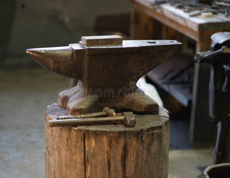 Iron Anvil Stands on a Wooden Stump Stock Photo - Image of molten ...