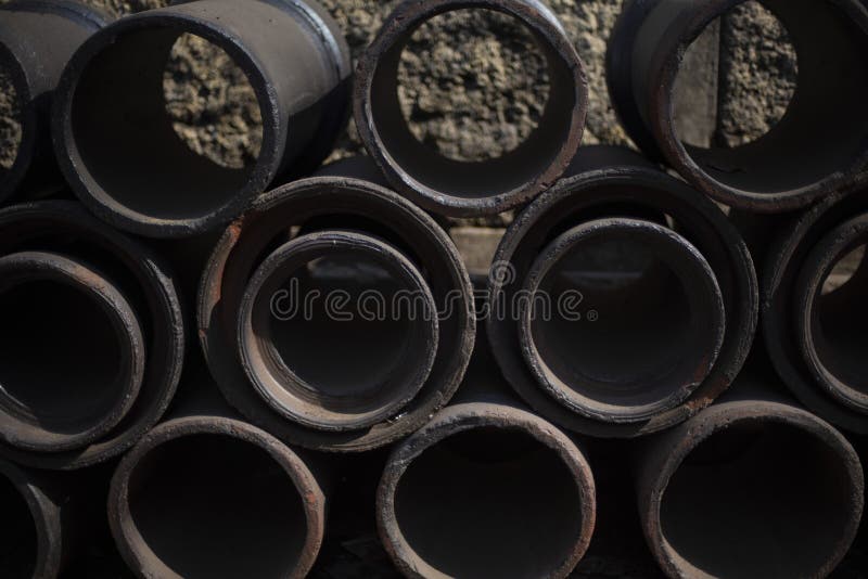 Iron Barrels are Arranged in a Regular Pattern in the Street. Stock ...