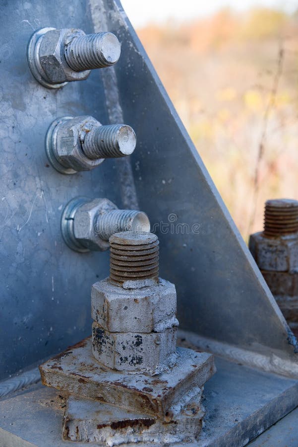 The Iron Base Supports the Power Line is Fixed by the Bolt. Stock Photo ...