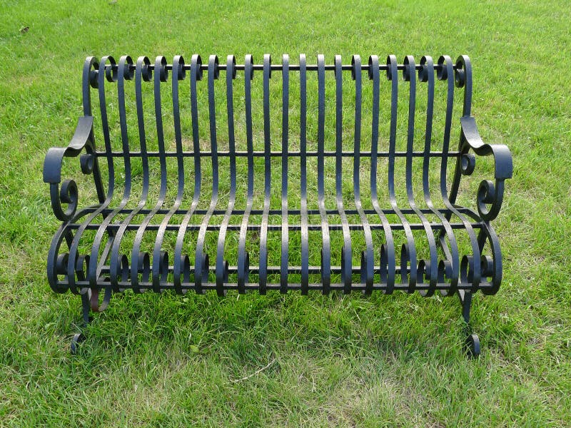 An iron bench stock image. Image of lawn, alone, nature - 32737877