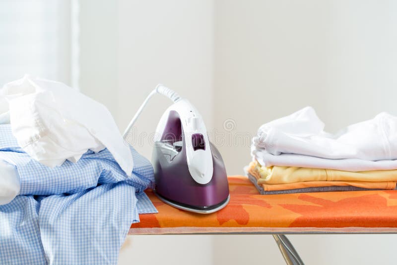 Iron on a board stock photo. Image of close, iron, ironing - 49039458