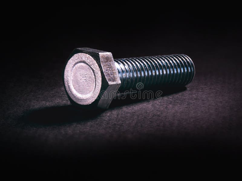The Iron Bolt on Black Background Stock Photo - Image of bolt, steel ...