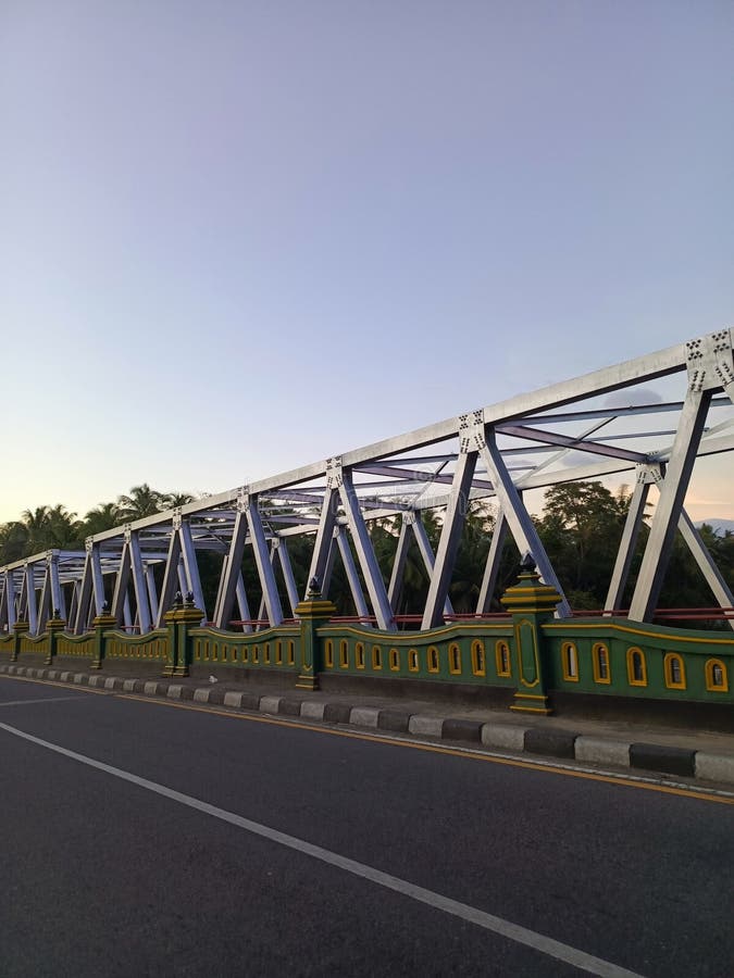 An Iron Bridge Decorated with Green and Yellow Walls Stock Photo ...