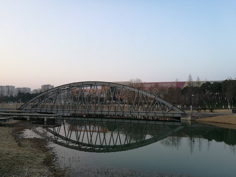 Iron Bridge Reflecting on the Peaceful River and Lake Editorial Stock ...