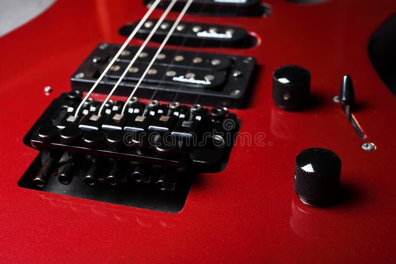 Iron Bridge for Securing and Tensioning the Strings. Red Electric ...