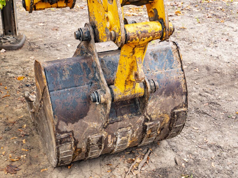 Iron Bucket of a Construction Excavator Stock Photo - Image of crushed ...