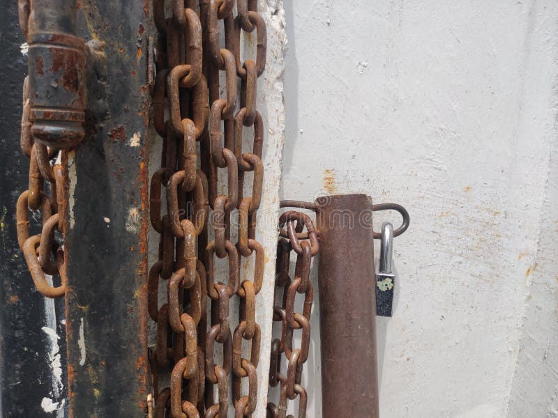Iron and Chain Portrait on a White Wall Stock Photo - Image of chain ...