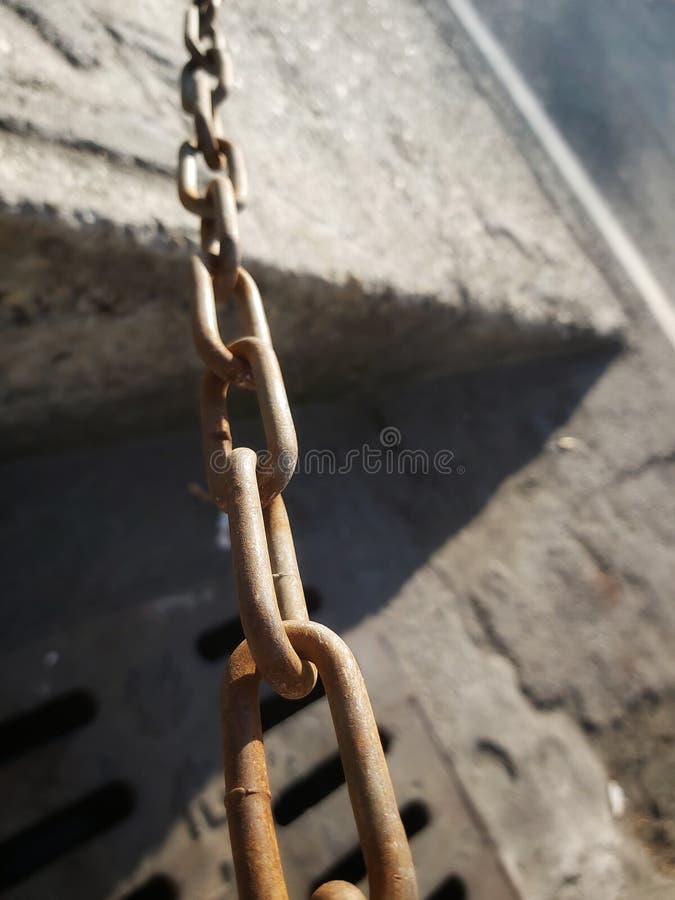 Iron Chains in Front of the Yard in the Daytime Stock Image - Image of ...