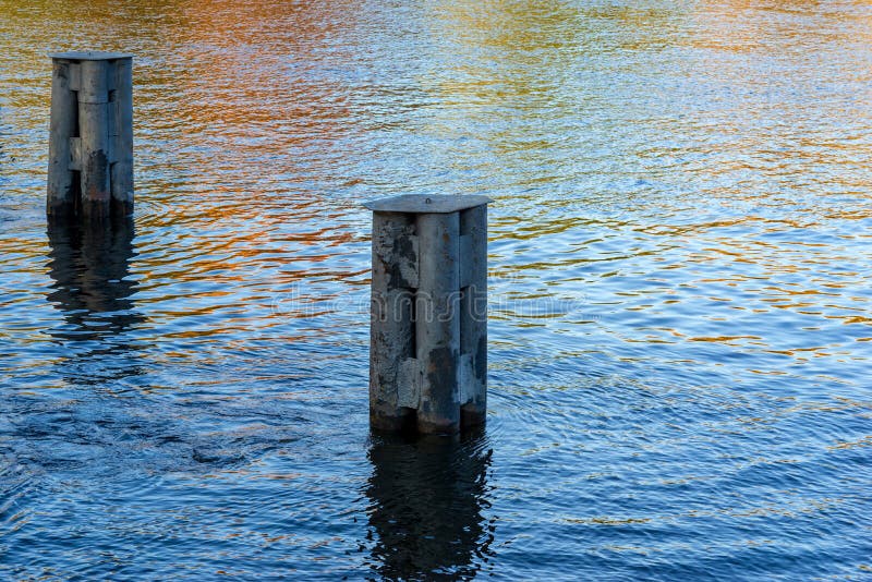 Iron columns in water stock image. Image of lake, closeup - 129855951