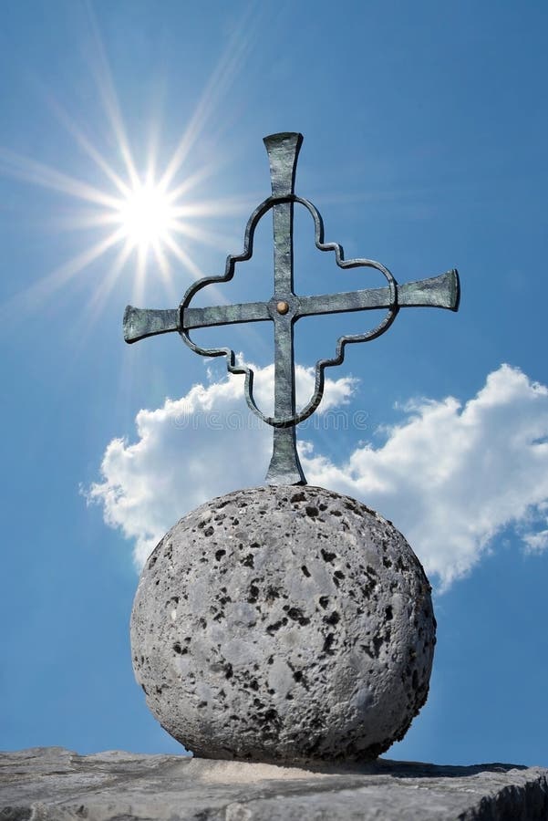 Iron Cross on a Stone Ball, Bright Sunshine Stock Image - Image of blue ...