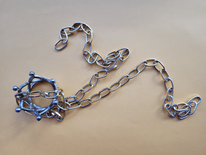 Iron crown with iron chain stock image. Image of bracelet - 241301509