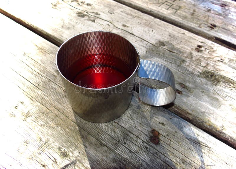 Iron Cup with Red Tea on a Wooden Table Stock Image - Image of liquid ...