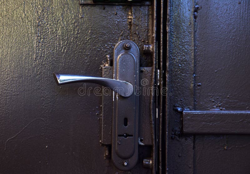 Iron Door Handle on Iron Gray Doors Stock Photo - Image of retro ...