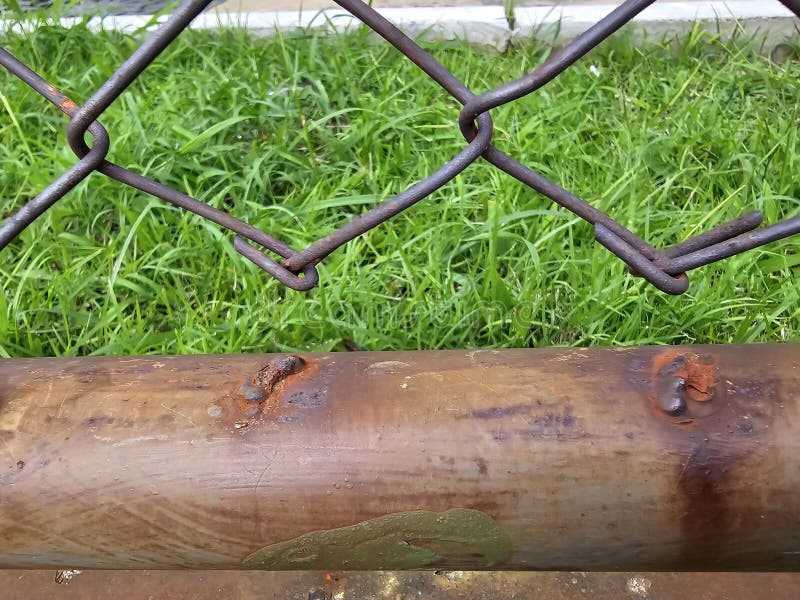 The Iron Fence Has Rusted through and is Now Damaged Stock Image ...
