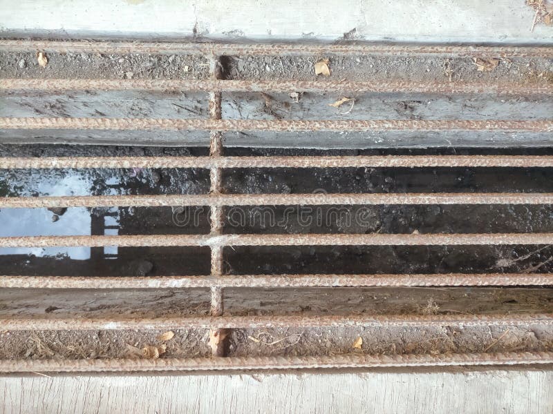 Iron fence over the trench stock photo. Image of line - 232175302