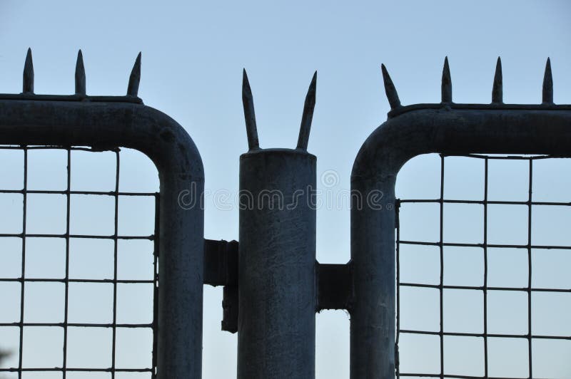 Iron fence with thorns stock photo. Image of burglar - 45038672