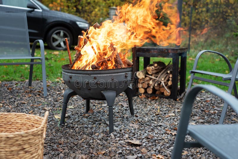 Fire Pit and Burning Fire in a Garden Stock Image - Image of camp ...