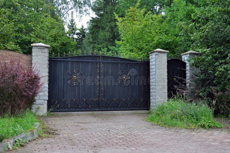 Iron Front Gate of a Beautiful Home Stock Photo - Image of building ...