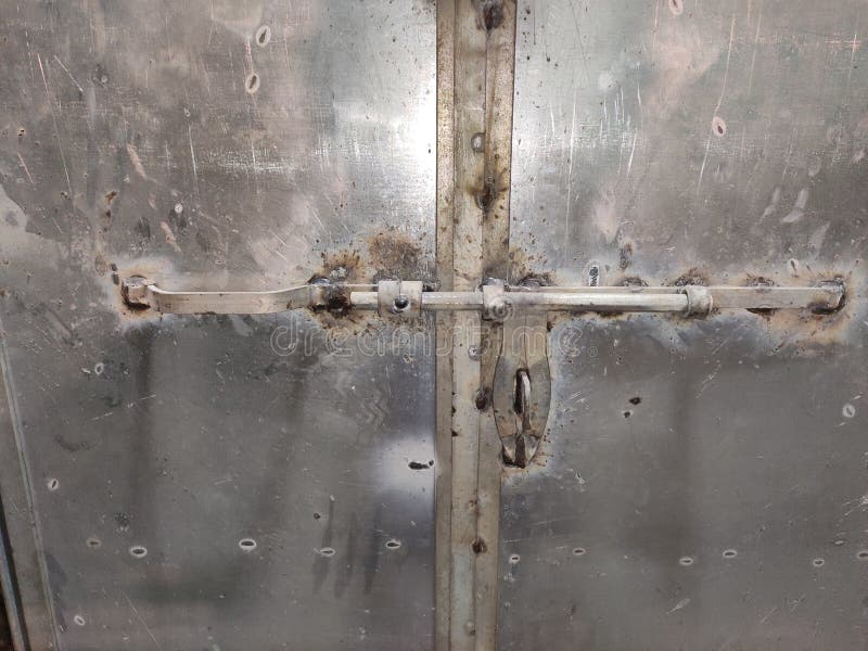 Iron Galvanized Door with Handle Locked by Its Lach. Stock Image ...