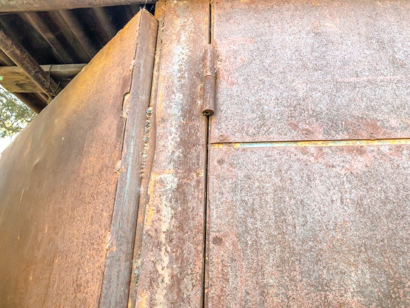 Iron Garage Doors. Rusty Door. Door Hinges Stock Image - Image of ...