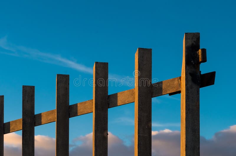 Iron gate on blue sky stock image. Image of sunset, gate - 53953473