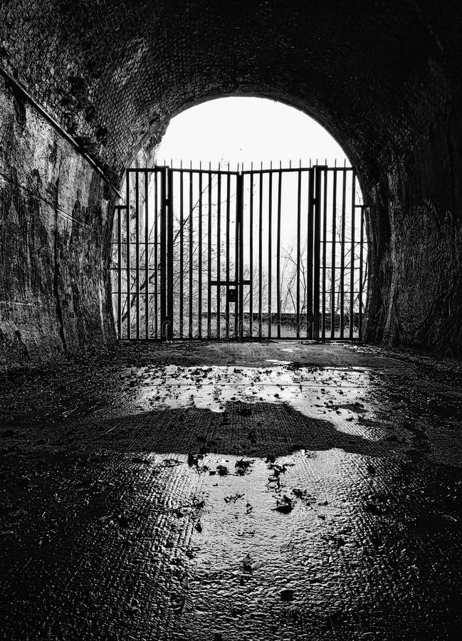 Iron Gate at the End of a Tunnel Stock Image - Image of grunge ...