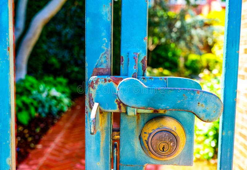 Iron Gate with an Old Brass Lock Editorial Photography - Image of ...