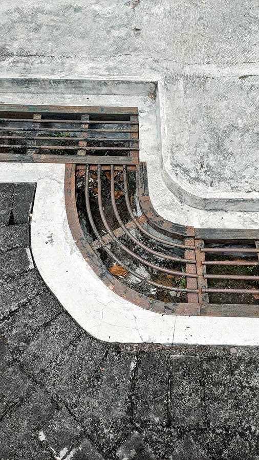 Iron Grate Drainage Channel on Pedestrian Path. Drains with Iron Bars ...