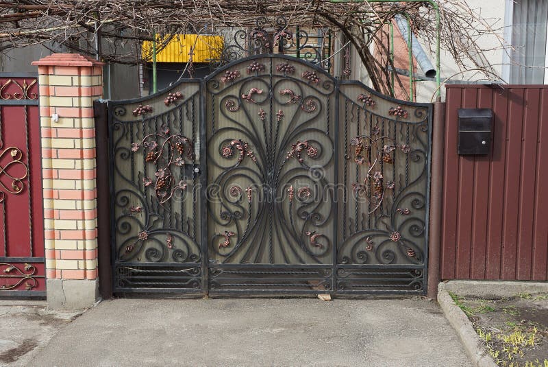 Iron Gray Gate with Black Forged Pattern Stock Image - Image of closed ...