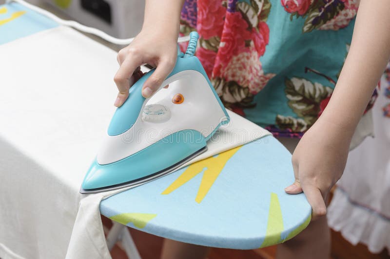 Iron stock image. Image of laundry, hand, chores, iron - 32656453