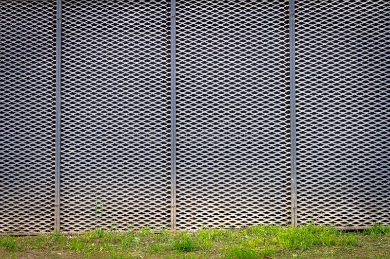 Iron Grid Wall and Green Grass Stock Image - Image of steel, protection ...
