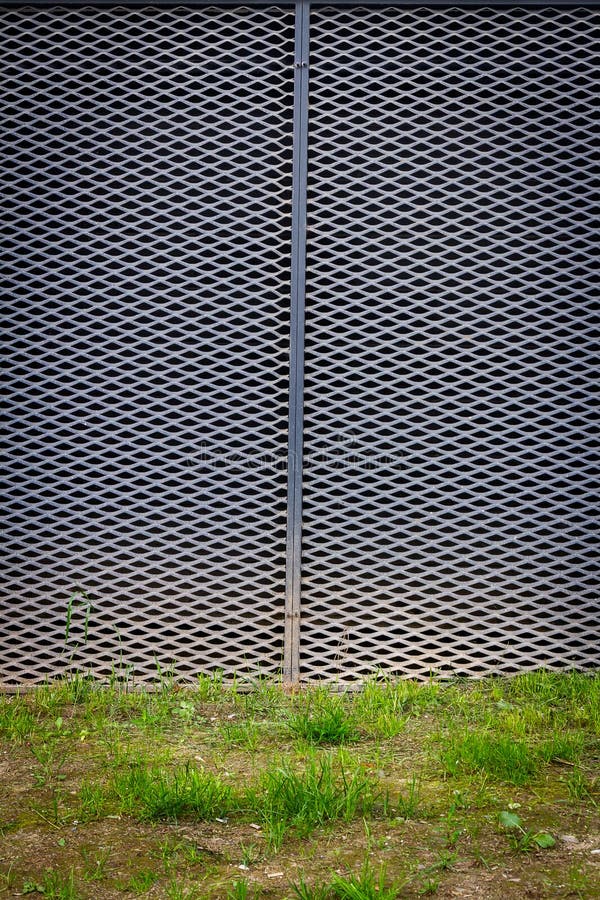 Iron Grid Wall and Green Grass Stock Image - Image of metal, protection ...