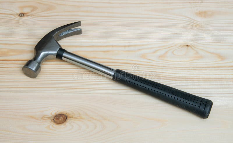 Iron hammer on wooden stock image. Image of work, steel - 80982359