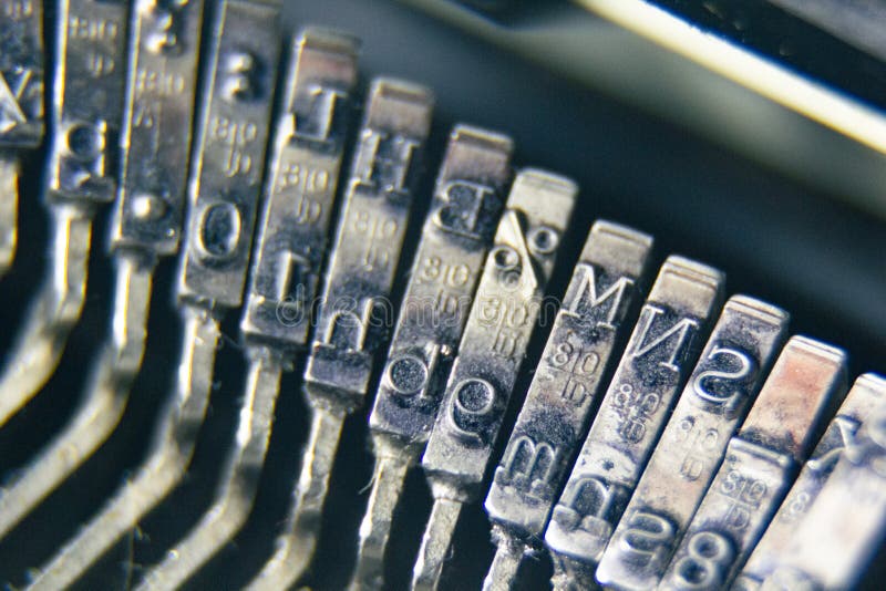 The Iron Hammers with the Letters Imprinted Inside an Old Typewriter ...