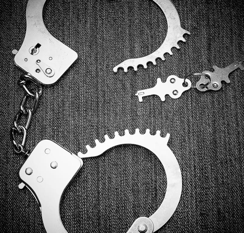 Iron Handcuffs with Two Keys Stock Photo - Image of chain, security ...