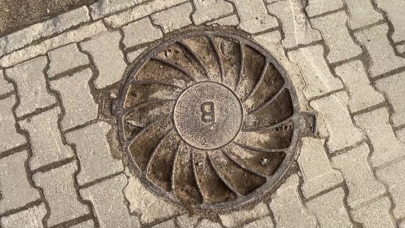 A Iron Hatch with a Pattern Above an Observation Well is Located on ...