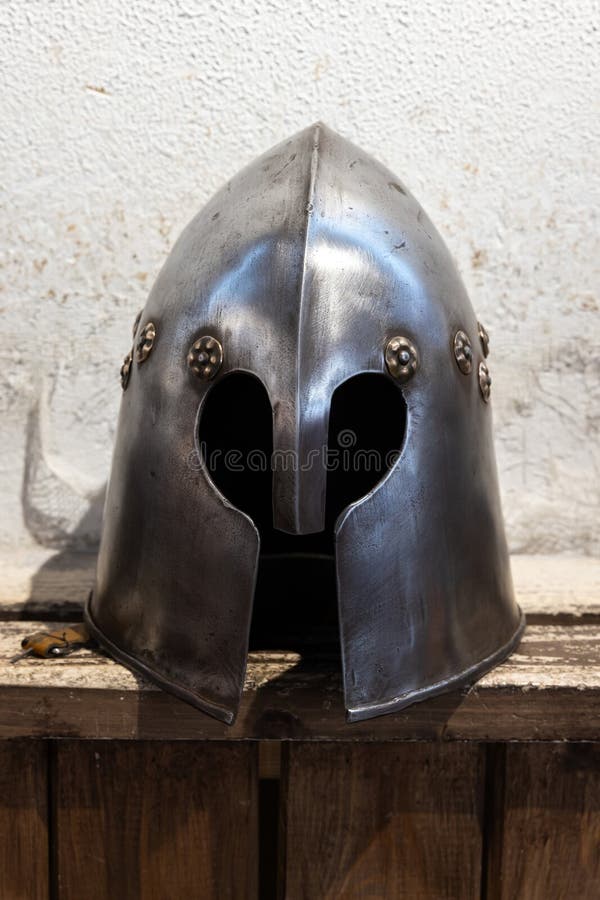 Iron Helmet of Medieval Knight is on a Shelf Stock Photo - Image of ...