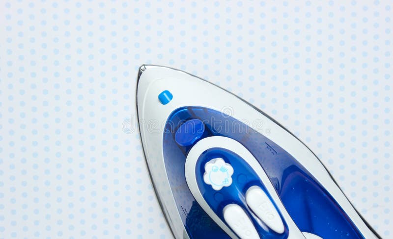 Iron for Ironing on a Tablecloth. Top View. Stock Photo - Image of ...