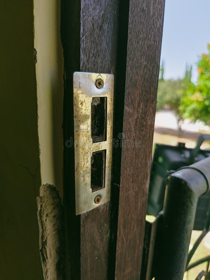 Iron keyhole on the door stock photo. Image of wood - 341973062