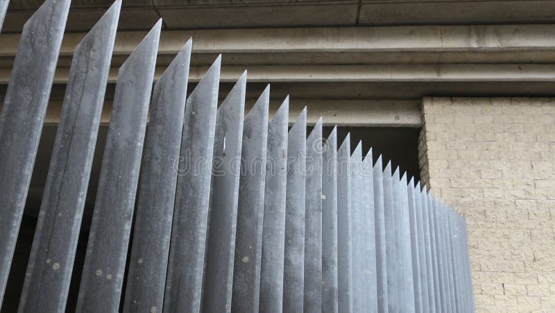 Gate with Sharp Edges and Wall Stock Image - Image of gate, metal ...