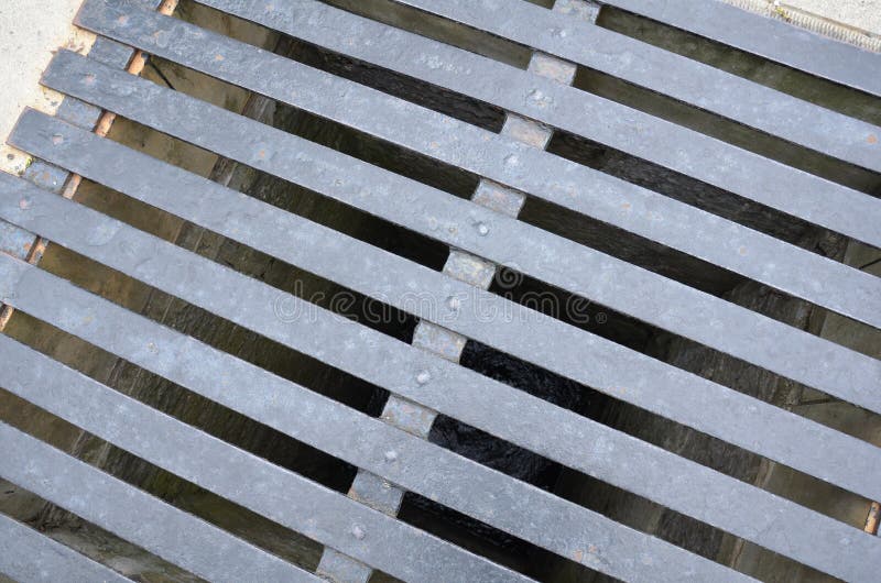 Iron Metal Grate Covering Over Well with Water Stock Image - Image of ...