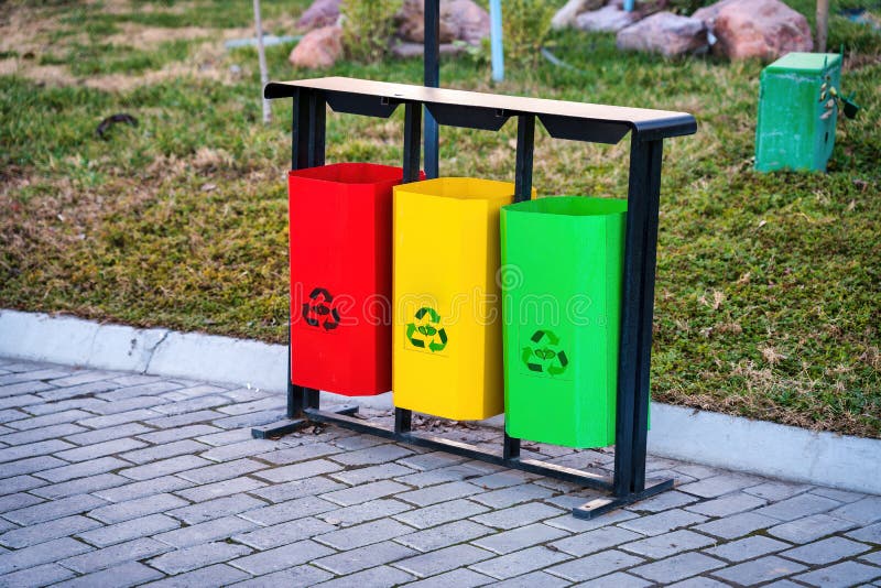Iron Multi-colored Containers for Separate Waste Collection. Stock ...