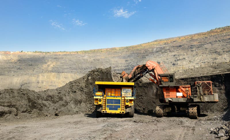 Iron ore mining stock photo. Image of machinery, mining - 164158846