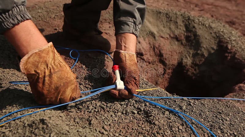 Explosives Work in a Quarry. the Process of Placing Explosives in an ...
