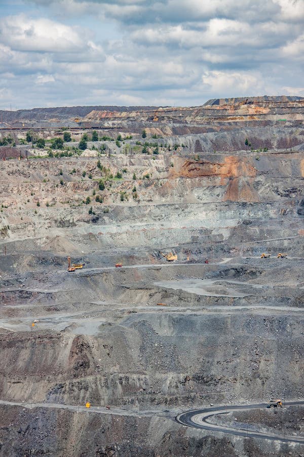Ore mining stock photo. Image of mountains, muddy, earth - 19354076