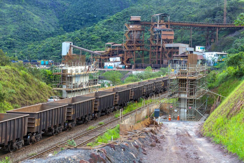 Iron ore train, loading stock image. Image of freight - 258890217