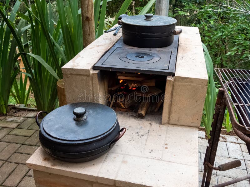 Iron Pan on a Rustic Brick Stove. Stock Image - Image of pond, table ...