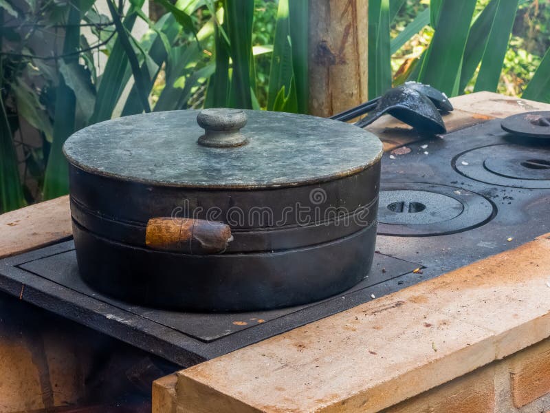 Iron Pan on a Rustic Brick Stove. Cooking Outside. Stock Image - Image ...